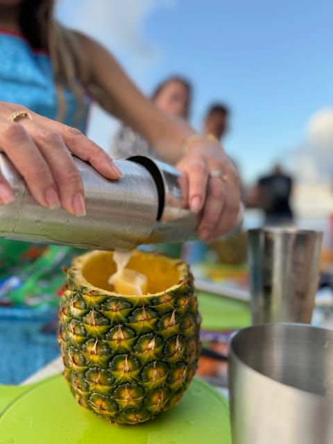 Piña colada workshop with ocean waves | GetYourGuide