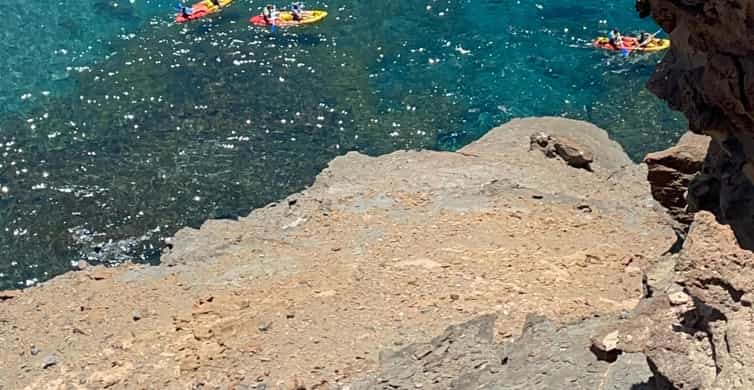 Mogán: Guided Kayak to Caves and Snorkeling Tour | GetYourGuide