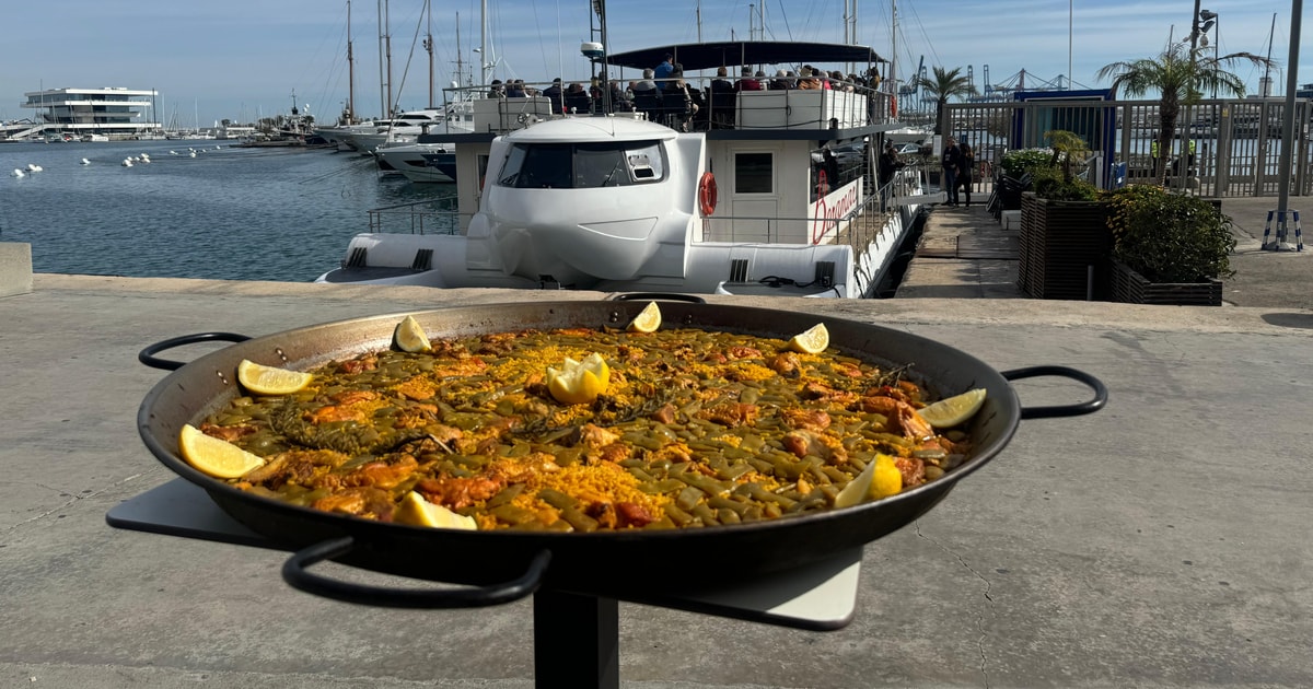 Valencia: Catamaran Cruise, Paella Lunch and Swim Stop | GetYourGuide