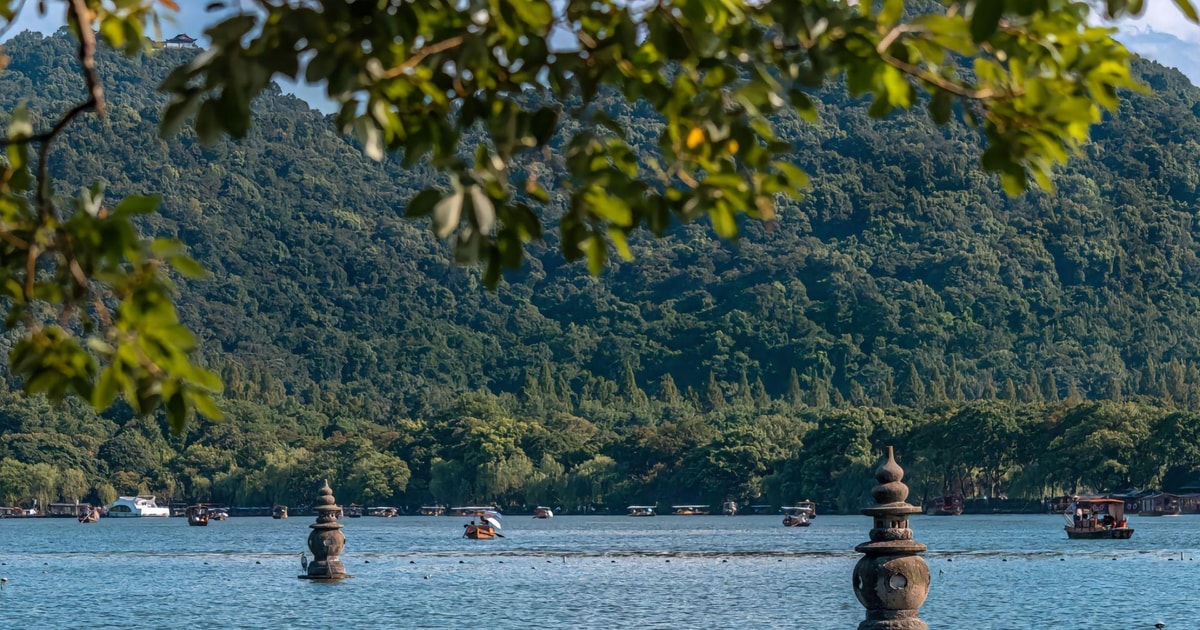 From Shanghai:Hangzhou Temples, Lake Views &Night Market Fun | GetYourGuide