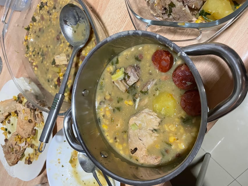 Catchupa cooking and eating ;)- | GetYourGuide