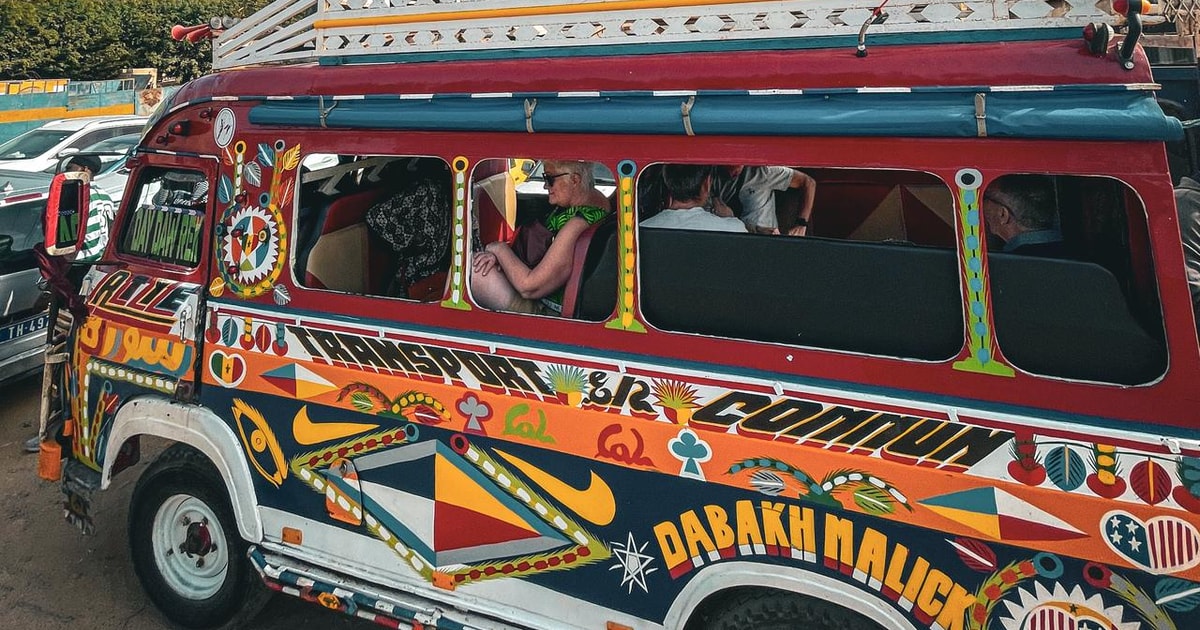 Dakar: visit the city on board an iconic express bus | GetYourGuide