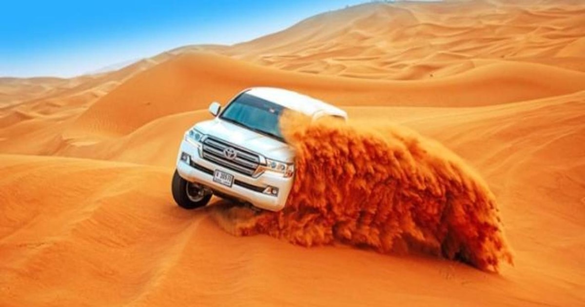 December Sale: Desert Safari Dubai, BBQ, Camel & Sand ride | GetYourGuide