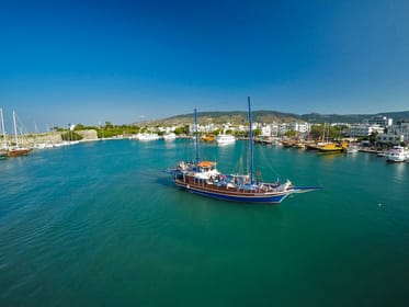 From the Port of Kos: Full Day Boat Cruise to 3 Islands | GetYourGuide