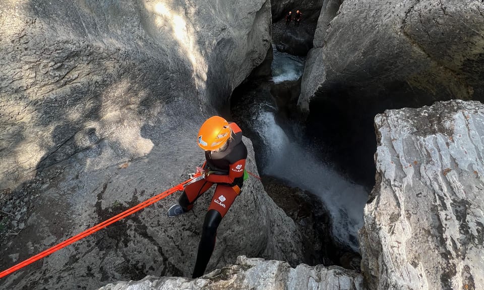 Banff: Ghost Canyon Tour with Slides, Rappels, & Jumps | GetYourGuide