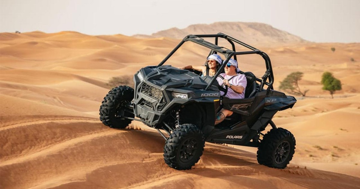Dubai: Quad Bike, Dune Buggy, and Sandboarding Experience | GetYourGuide