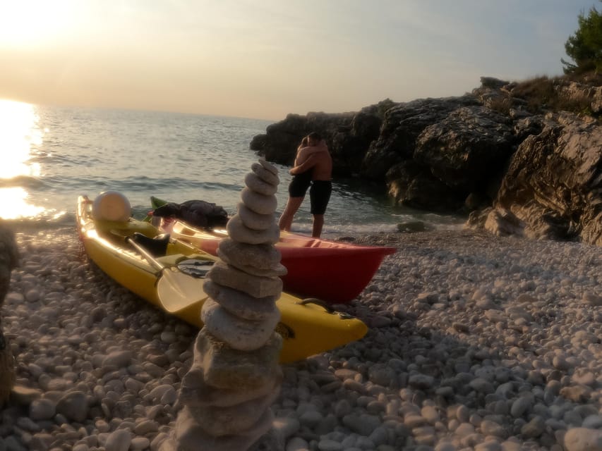 Pula: Sea Cave and Cliffs Guided Kayak Tour in Pula | GetYourGuide