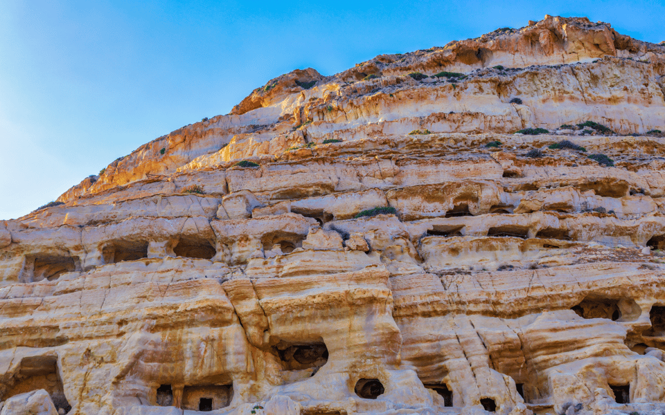 From Heraklion: Matala, Hippies Caves & Ancient Gortyn | GetYourGuide