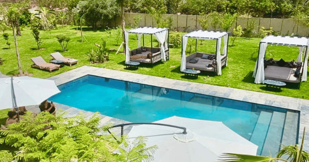Day Pass to Pool Access with Lunch and Pickup Transfers | GetYourGuide