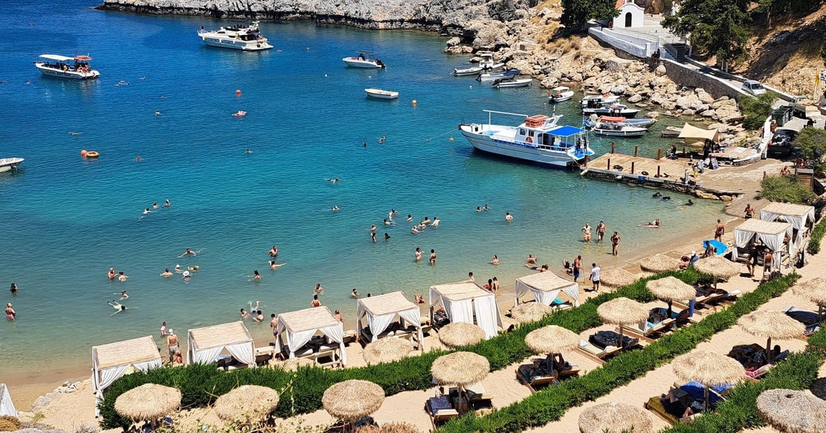 Lindos: Boat Cruise with Swim Stops, Fruit & Drinks | GetYourGuide
