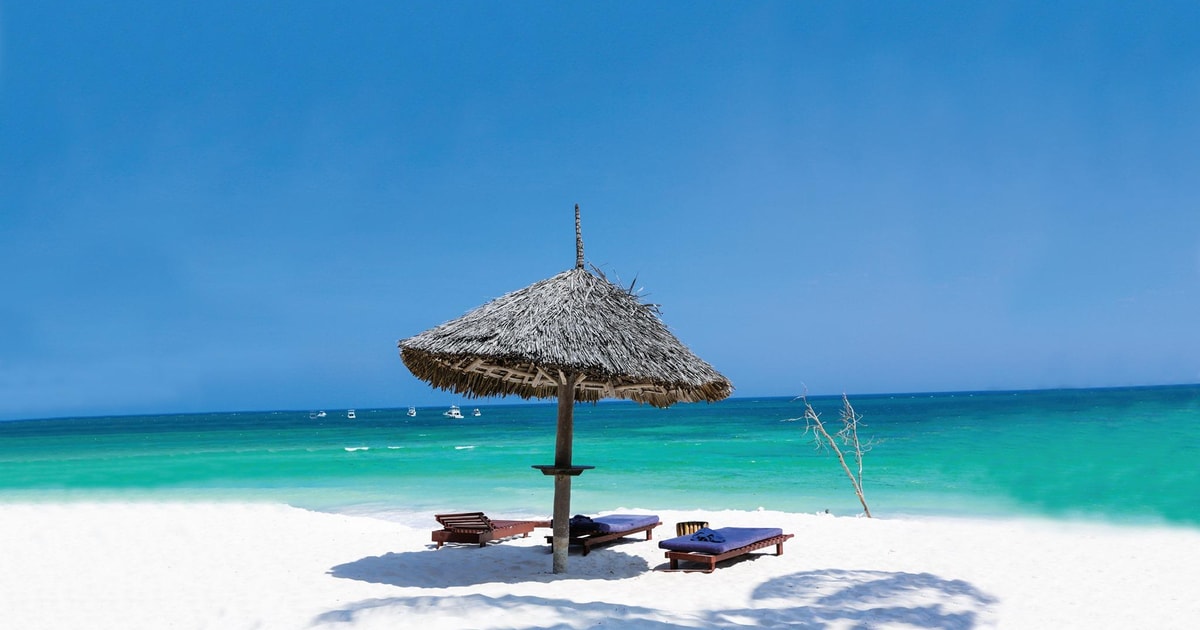 Kuza Cave, Lunch at The Rock Restaurant, Mnemba Snorkeling | GetYourGuide