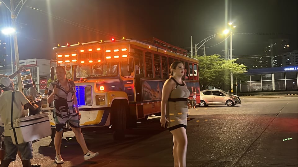 Colorful bus party visit to historic places & club entrance | GetYourGuide