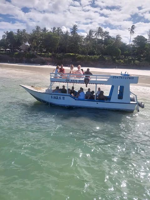 Diani Beach: Guided Glass Bottom Boat Cruise Tour And Lunch. | GetYourGuide