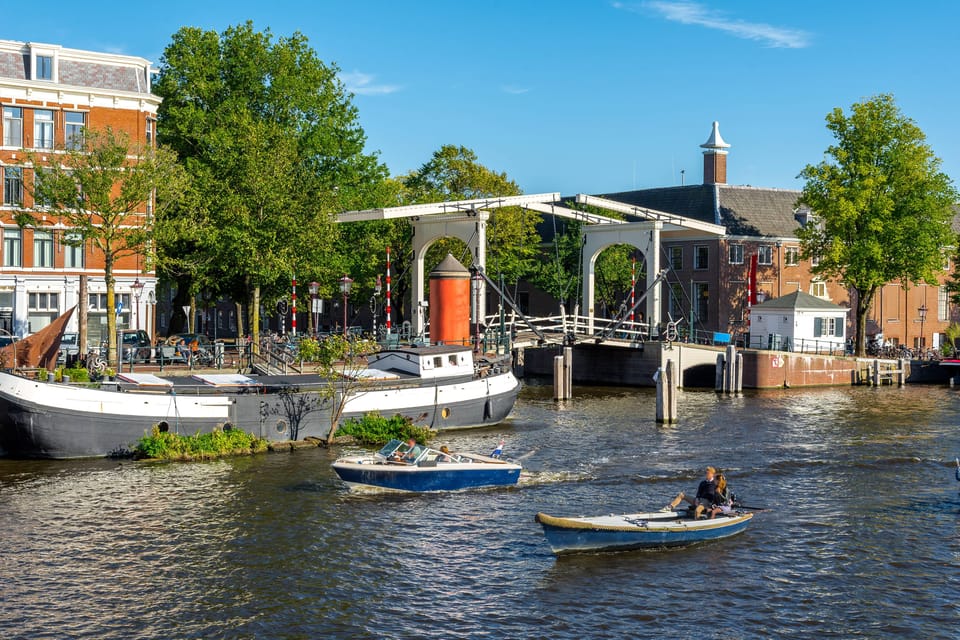 Amsterdam to Zaanse Schans Windmills, Volendam & Edam by Car | GetYourGuide