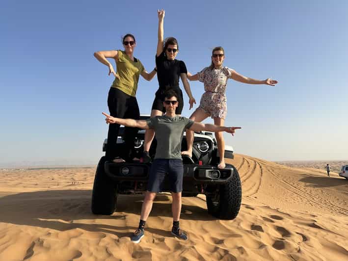 Dubai Jeep Wrangler Sunset Desert Experience & Sandboarding | GetYourGuide
