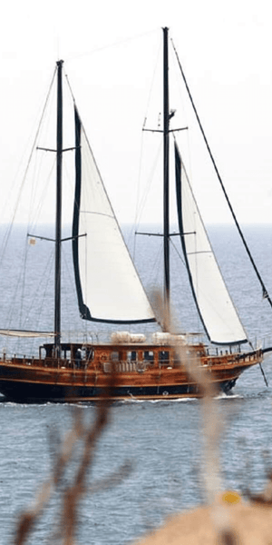 Live Music & Sunset Wooden Boat in Barcelona | GetYourGuide