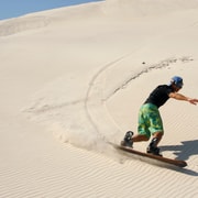 Doha: Desert Safari, Sandboarding, Camel Ride and Inland sea | GetYourGuide