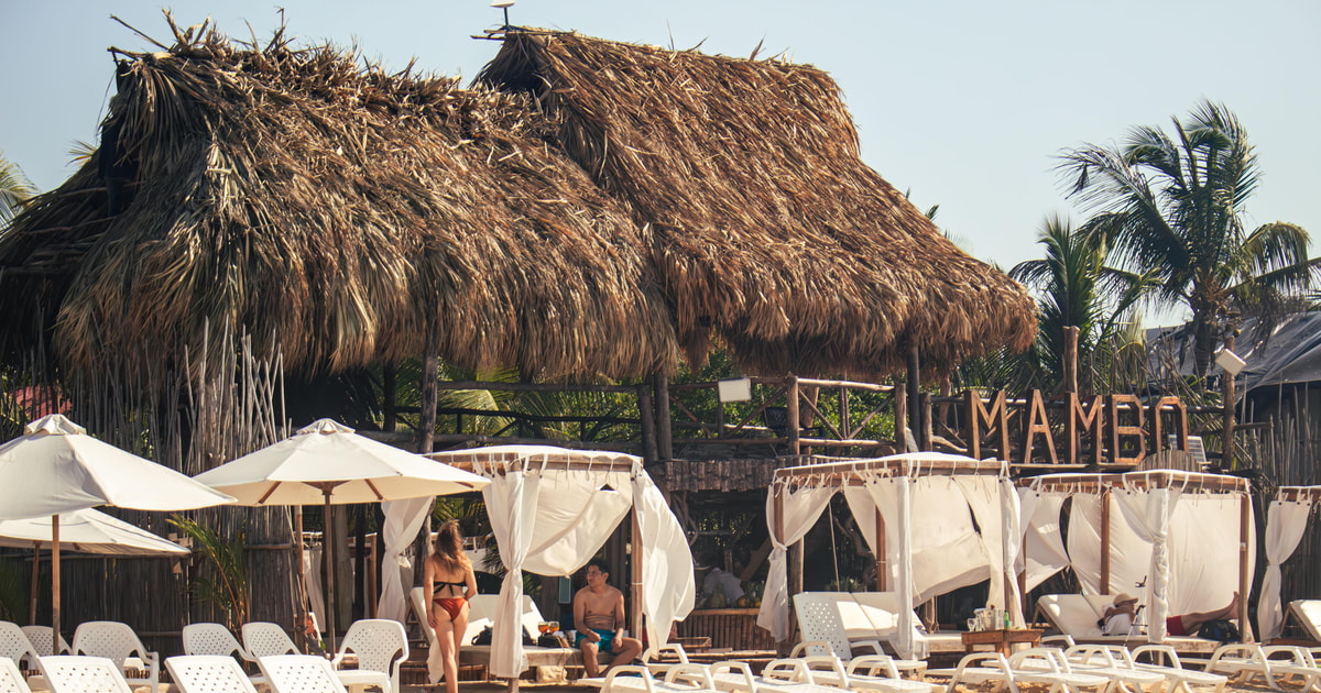 Full day at Isla baru playa blanca in Mambo Beach club | GetYourGuide