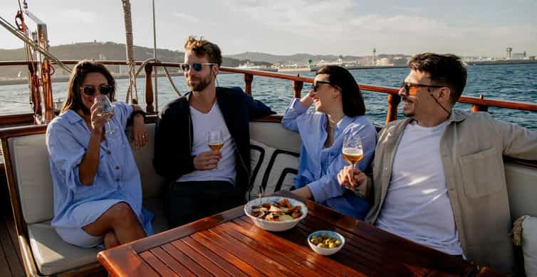 Live Music & Sunset Wooden Boat in Barcelona | GetYourGuide