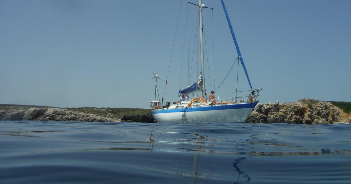Sailboat full day excursion-Fornells | GetYourGuide