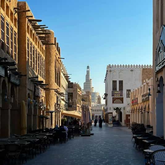 Doha: traditional Dhow Harbour, Skyline view , Sunset | GetYourGuide