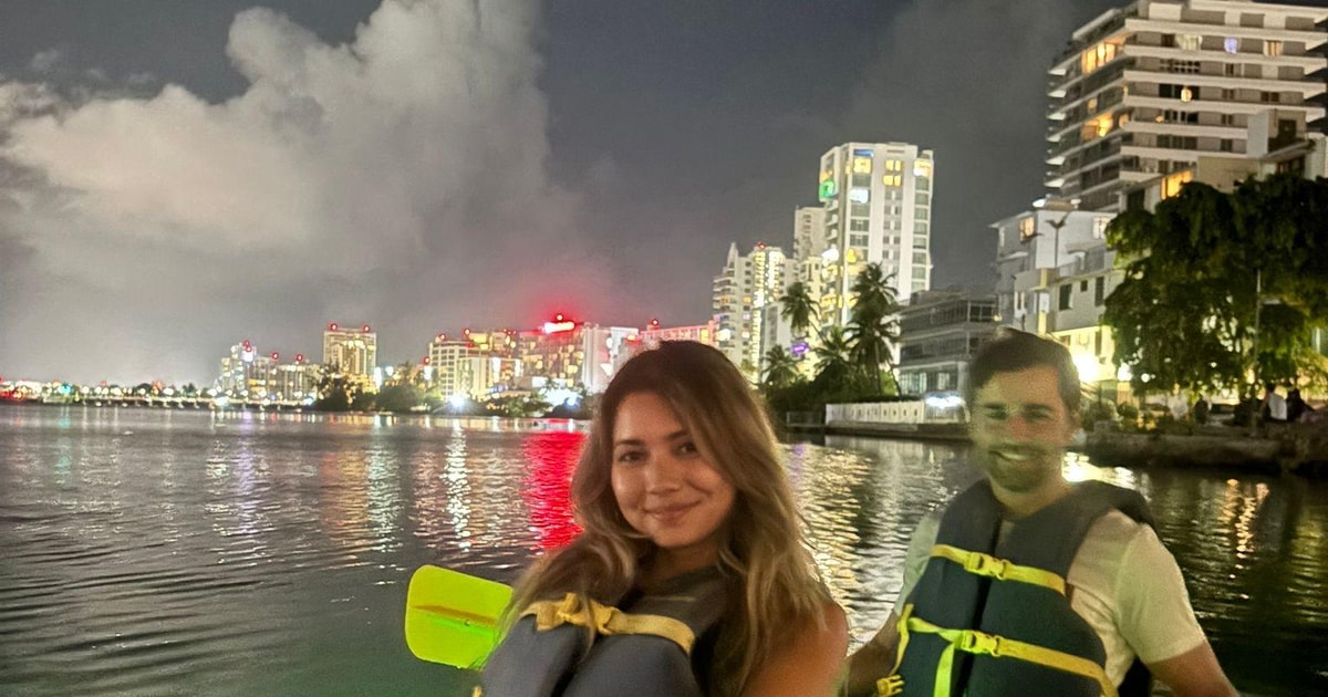 San Juan: Condado Lagoon by Night on an LED Crystal Kayak | GetYourGuide