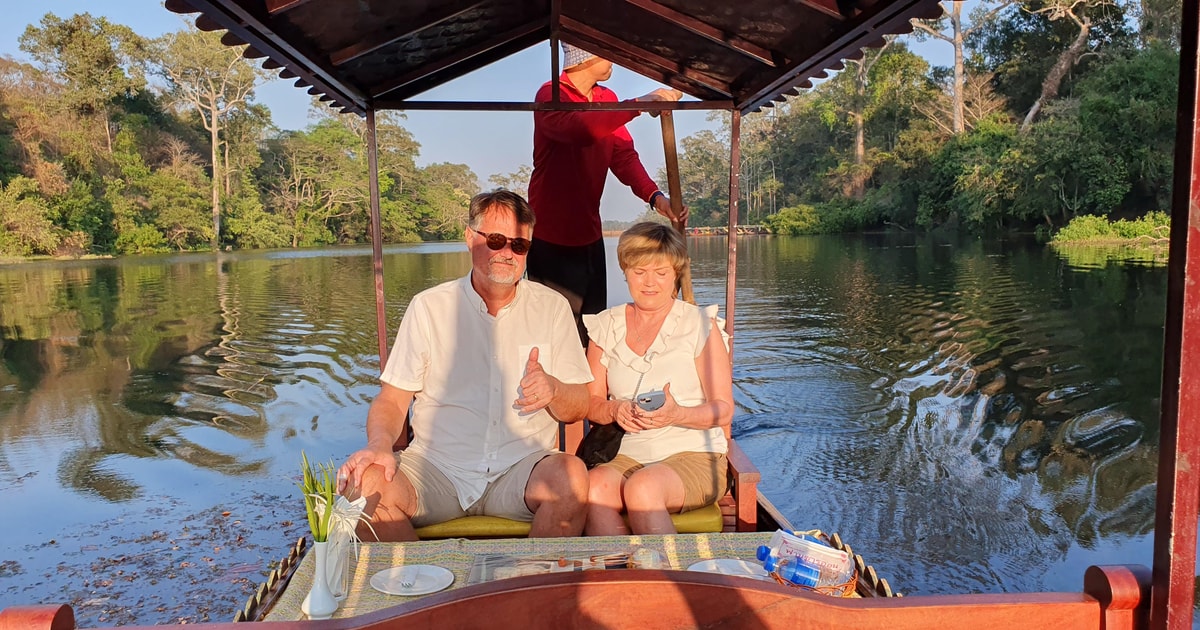 Angkor Bike tour & Gondola Sunset Boat w/ Drinks & Snack | GetYourGuide