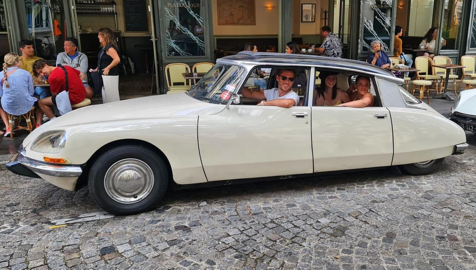 The Unmissable of Paris on a classic open-top Citroën DS | GetYourGuide