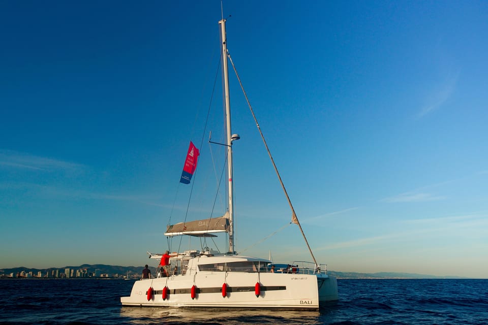 Barcelona: Lunch or Dinner Catamaran Sailing Tour | GetYourGuide