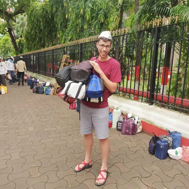 Meet Dabbawala Visit Dhobi Ghat & Dharavi slum with Train | GetYourGuide