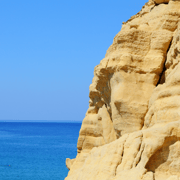 From Heraklion: Matala, Hippies Caves & Ancient Gortyn | GetYourGuide