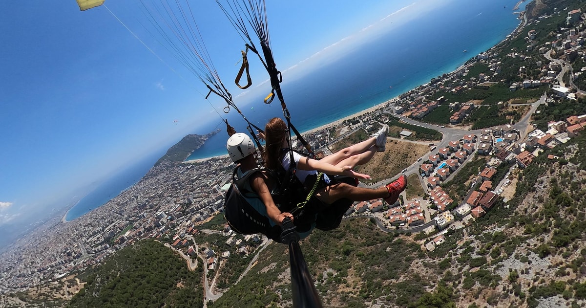Tandem Paragliding Adventure with Rental Wings | GetYourGuide
