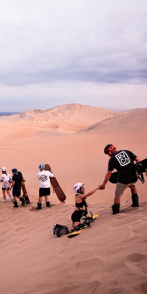 Qatar Desert Safari: Camel Ride, Sandboarding, Inland Sea. | GetYourGuide