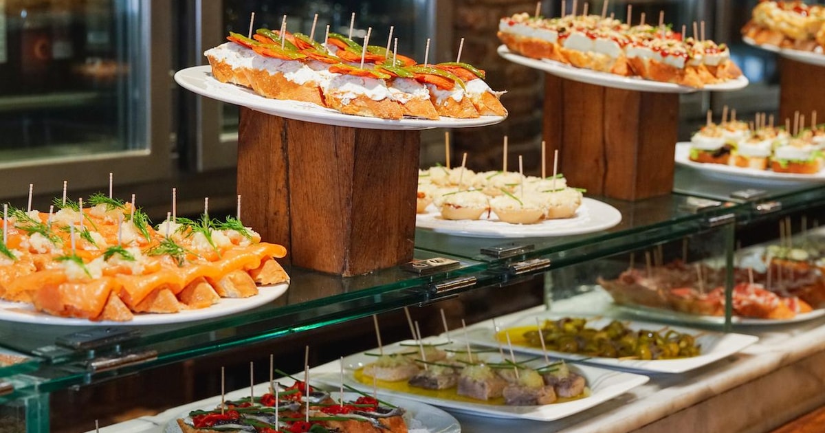 Barcelona: Tapas and Wine Self-Guided Tour in El Born | GetYourGuide
