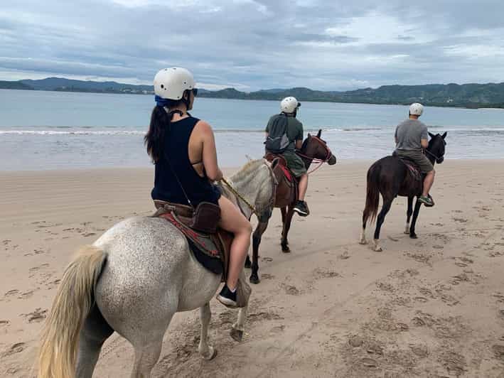 Horseback riding on the beach | GetYourGuide