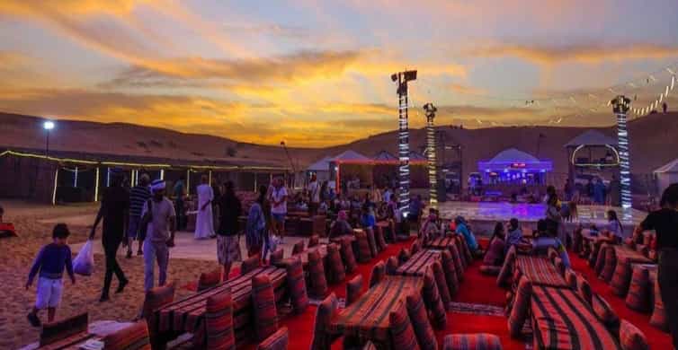 Desert Safari Dubai, Camel Ride, Dinner, Show & Sandboarding | GetYourGuide
