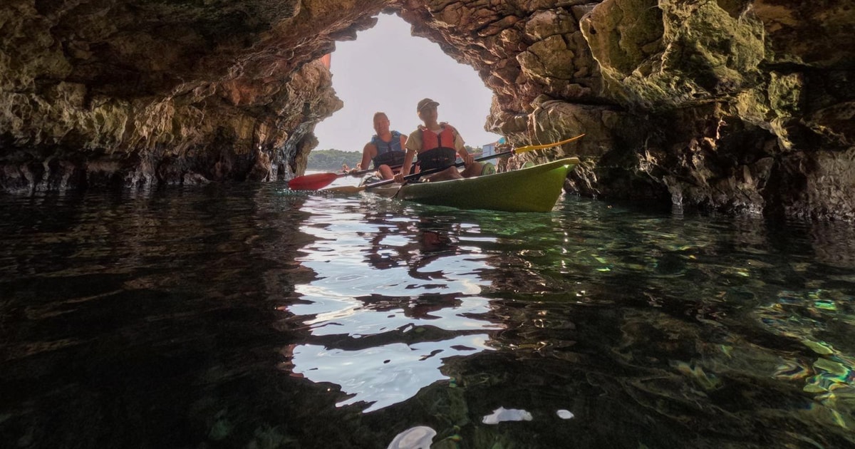 Pula: Islands, cliffs, cave, canyon, kayak tour, snorkeling | GetYourGuide