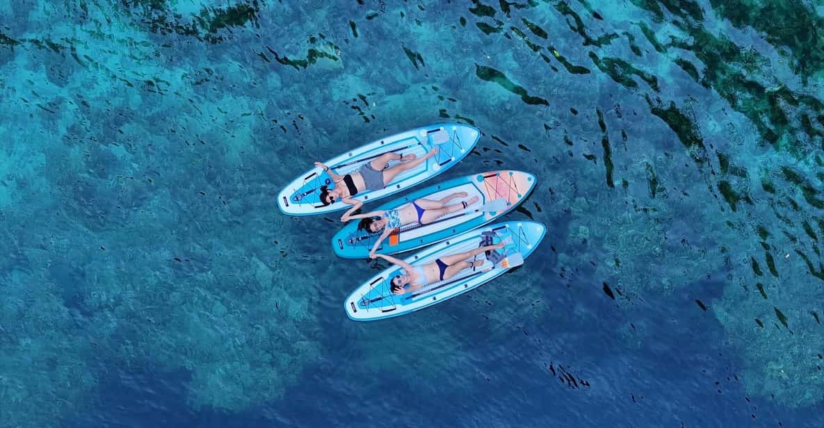 Coron: Kayangan Lake SUP met gids en snorkelen op het strand van CYC ...