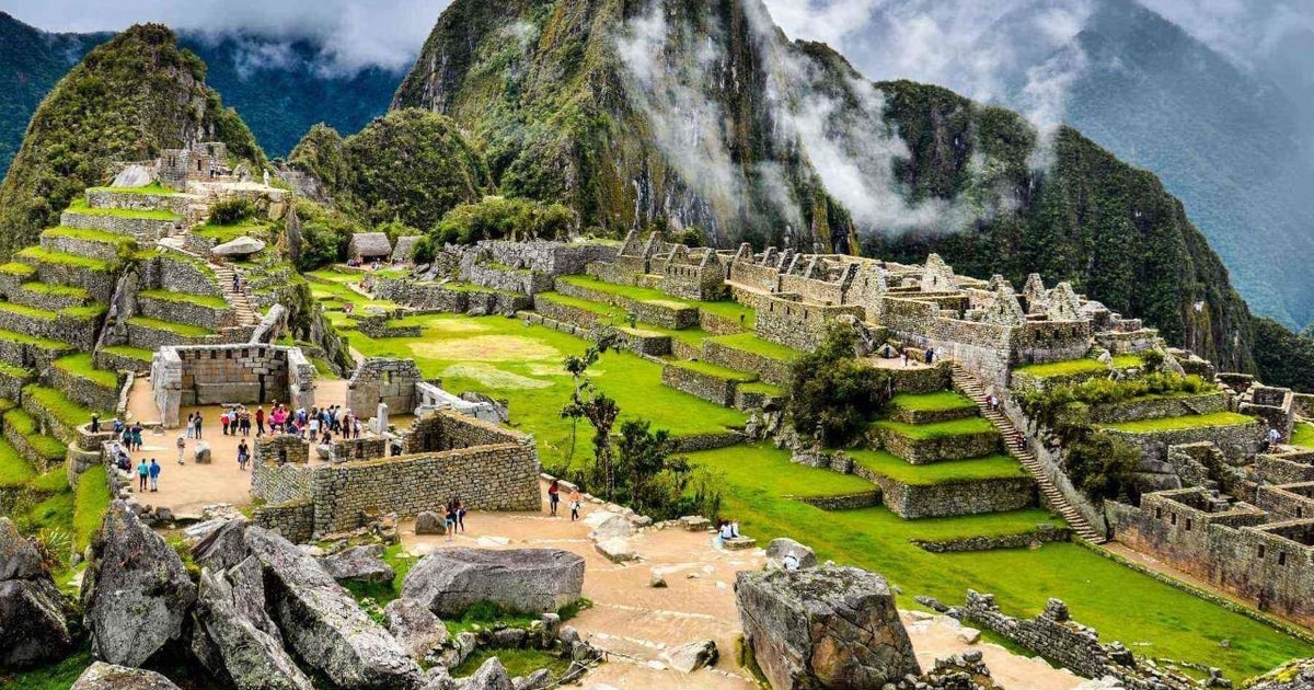 Het opwindende Machu Picchu, de Regenboogberg en Humantay | GetYourGuide